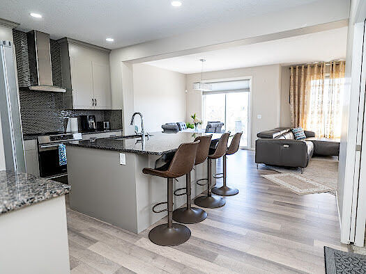 Calgary Pet Friendly House For Rent | Livingston | with a pond view ...